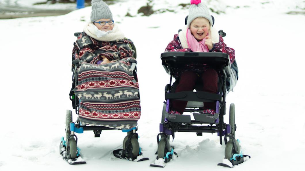 Snap-on wheelchair skis make getting out in the snow fun | Holland ...